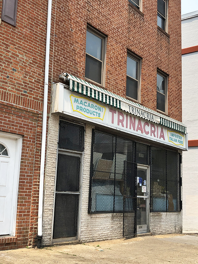 The unassuming storefront of Trinacria, where that vintage "MACARONI PRODUCTS" sign has been guiding hungry Baltimoreans to sandwich nirvana since 1908.