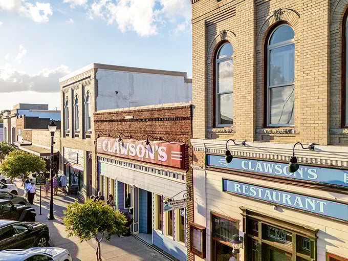 Beaufort's historic Front Street reveals its culinary treasure – Clawson's 1905 Restaurant stands proudly in its century-old brick building, a testament to timeless dining.
