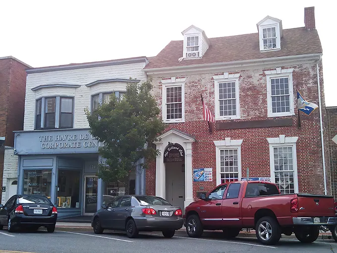 Washington Street welcomes visitors with its classic brick facades and outdoor dining spots. Small-town charm with big-city culinary aspirations.