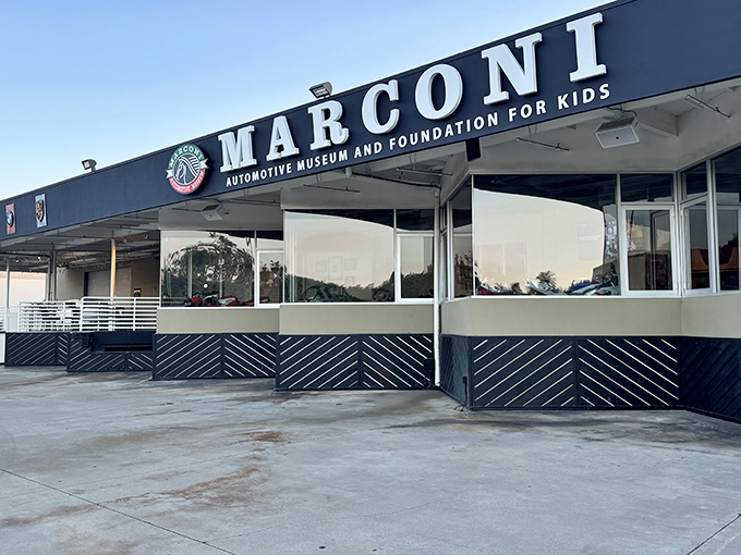 Even the parking lot is a car show at Marconi Automotive Museum, where Ferraris and Porsches casually hang out front like they're waiting for coffee.