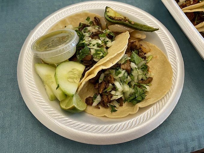 Traditional tacos dressed simply with cilantro and onion—proof that, like the perfect little black dress, some classics need no embellishment.