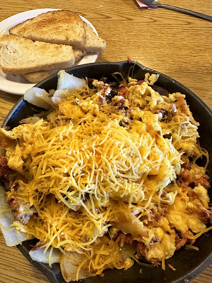 This skillet is what breakfast dreams are made of – layers of flavor excavated one delicious forkful at a time.