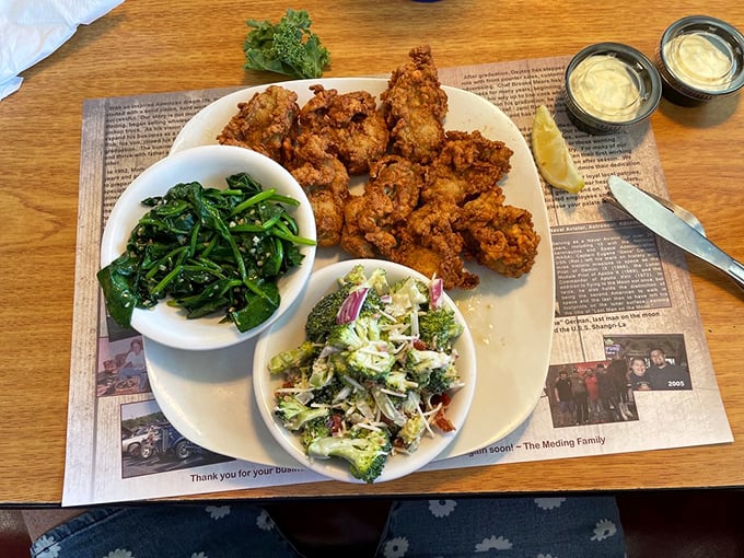 A plate that proves vegetables have their place—as delicious sidekicks to the star of the show: perfectly fried oysters.