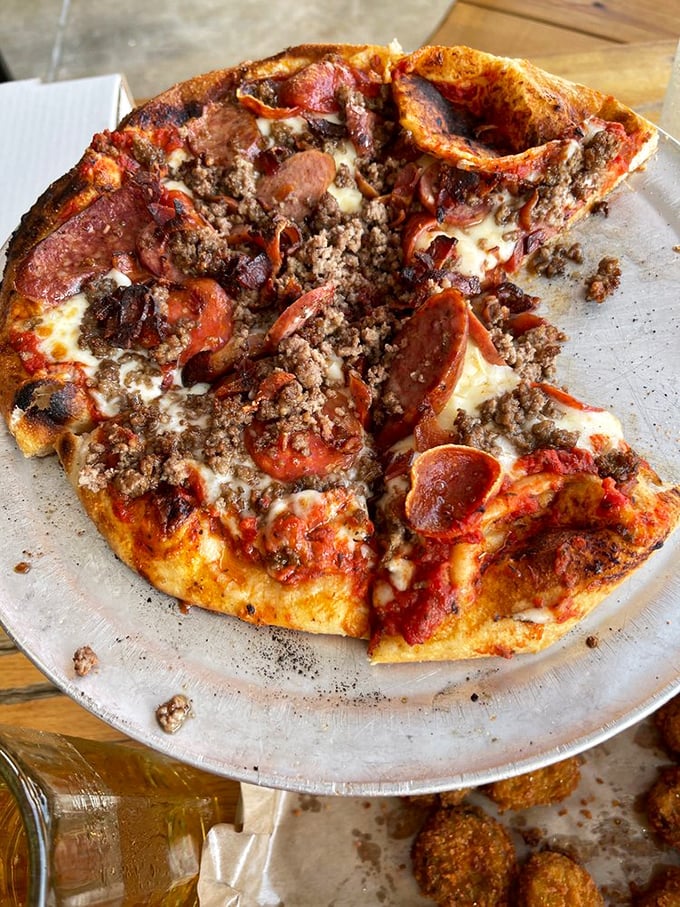 Pizza crashes the barbecue party with smoked meats as VIP guests—proof that good ideas don't stay in their lanes.