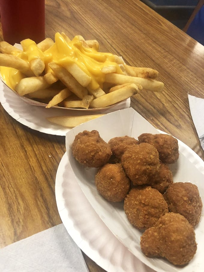 Golden fries and perfectly fried kibbee balls—proof that the supporting cast at Texas Hot Dogs deserves a standing ovation too.