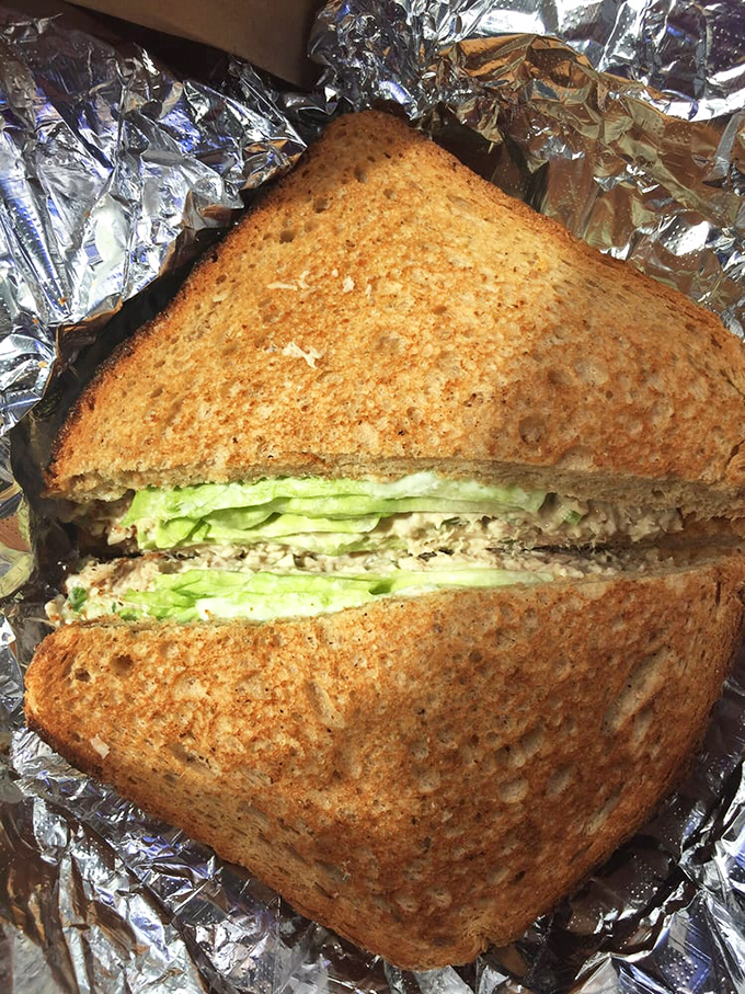 This sandwich isn't trying to impress Instagram—it's too busy focusing on flavor. Simple, honest lunch wrapped in foil like the gift it truly is.