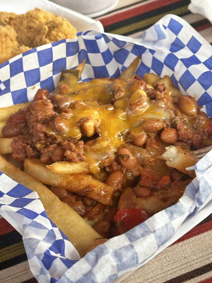 Chili cheese fries that laugh in the face of diet culture – a glorious mess that demands to be devoured without apology.