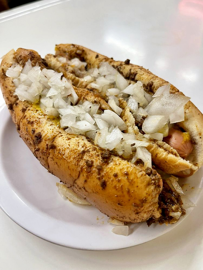 Close enough to see the steam rising, this Coney dog isn't just lunch—it's an edible institution that's survived every food trend imaginable.
