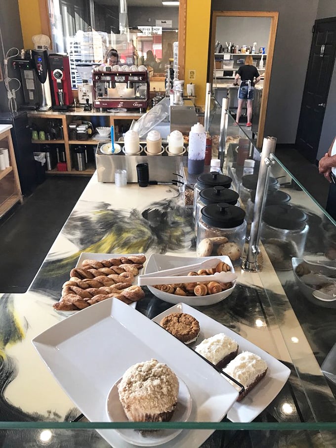 The display case – or as I call it, "the hardest decision-making spot in Arkansas." Each treat silently arguing for its rightful place on your plate.