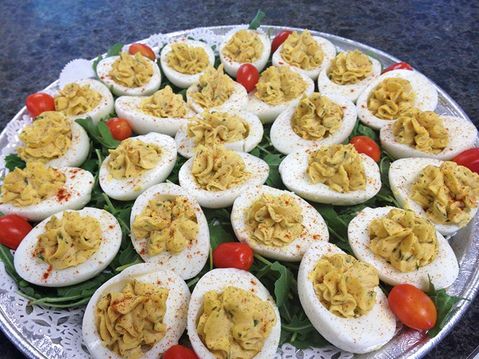 Deviled eggs that have clearly made peace with heaven—piped with precision and sprinkled with paprika for that classic touch of color.