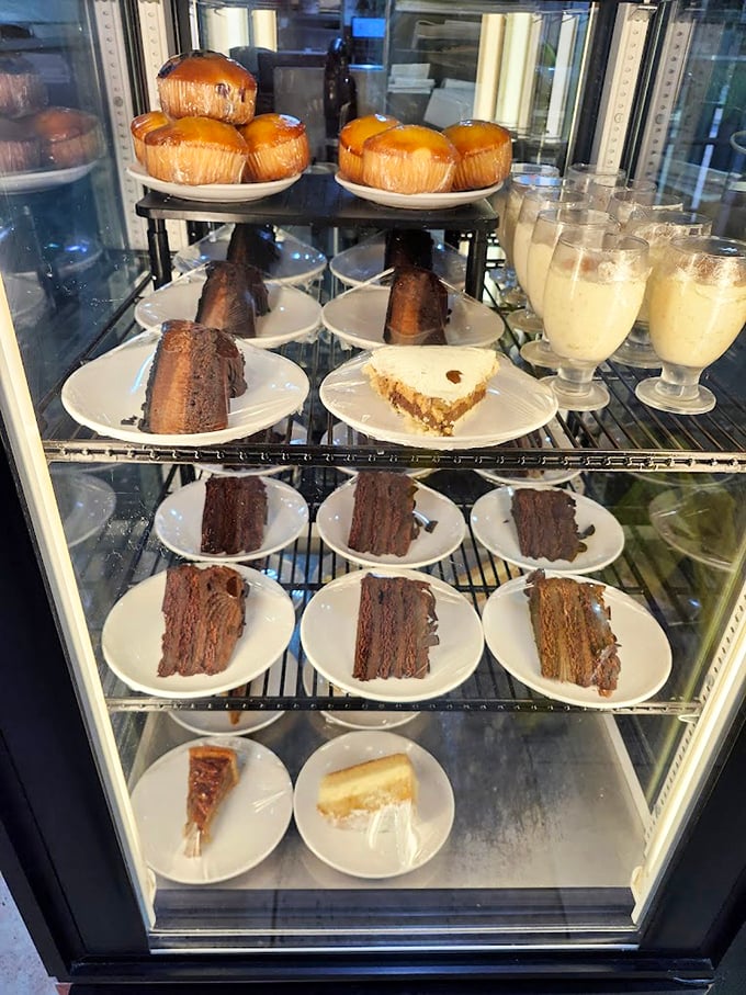 A dessert case that doesn't just display options—it issues a challenge. How will you possibly choose just one when chocolate cake, cream pies, and muffins are all vying for your attention?