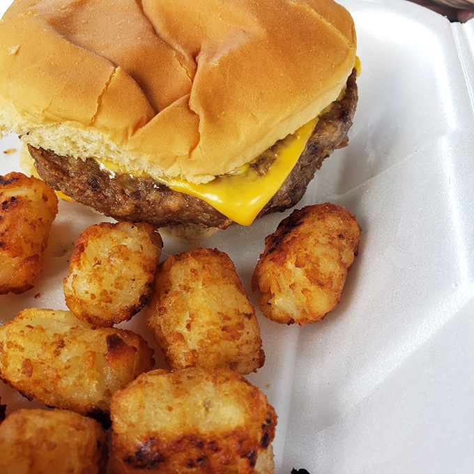 A classic cheeseburger with golden tater tots—the lunch that launched a thousand childhood memories. Sometimes paradise comes on a foam plate.