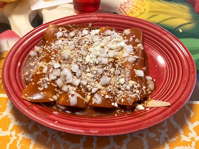 These enchiladas rancheras aren't just covered in sauce and cheese—they're smothered with the kind of love that makes you want to call your mother and thank her.