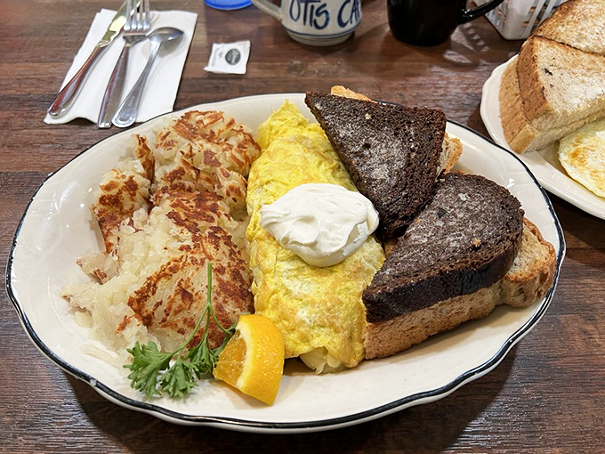 The José Omelette brings together eggs, cheese, and hashbrowns in perfect harmony. Like a well-rehearsed trio, each component knows exactly when to shine.