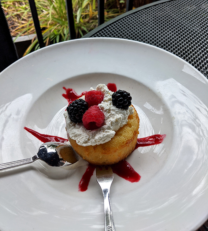 A dessert that understands the importance of balance—light cake, fresh berries, and just enough sweetness to make you forget you came for seafood.