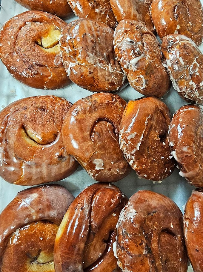 Cinnamon rolls with attitude. These aren't your airport food court rolls – these are the real deal, with glaze that means business.