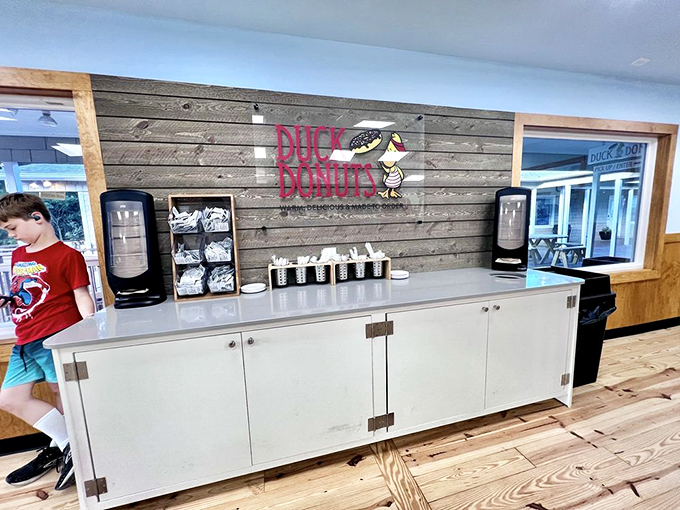 The coffee station—because every great donut deserves a worthy companion. A caffeine-and-sugar partnership that rivals Batman and Robin.