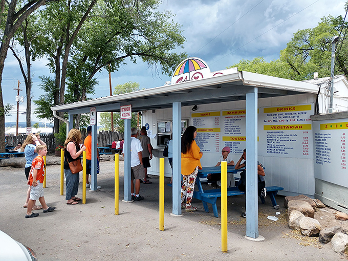 The universal language of good food – strangers becoming temporary neighbors while waiting for their taste of New Mexican paradise.