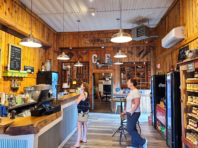 Where strangers become friends over shared tables and food recommendations. The cafe's interior invites you to linger just a little longer.