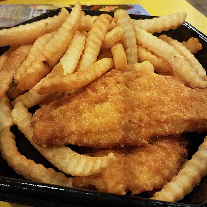 Even the fish gets the royal treatment at Pierce's. Those golden planks and crinkle fries are comfort food elevated to an art form.