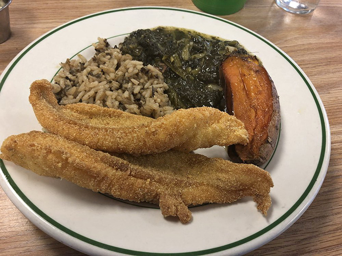 Crispy cornmeal-crusted catfish alongside the holy trinity of Southern sides. This plate doesn't just feed your hunger—it feeds your soul.