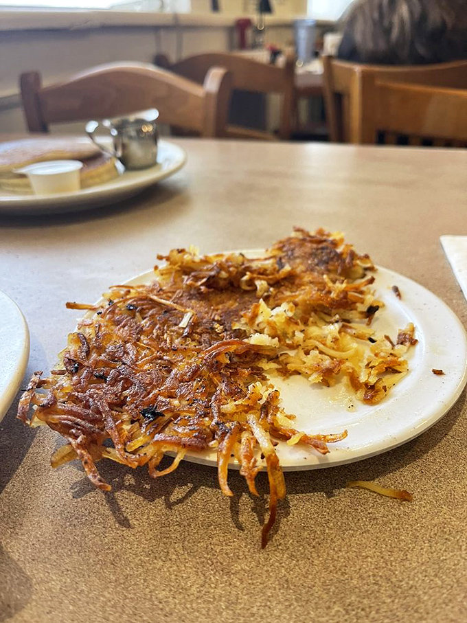 Hash browns with the perfect crisp-to-tender ratio – the unsung heroes of breakfast that deserve their own spotlight and standing ovation.