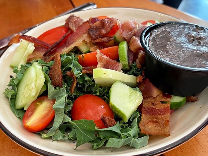 Even salads get the royal treatment at The Bluebird. Fresh greens, vibrant veggies, and bacon that didn't come from a bag—this is lunch done right.