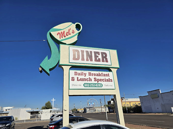 The iconic Mel's sign stands as a beacon of hope for the hungry, promising daily specials and the kind of hospitality that's becoming an endangered species.