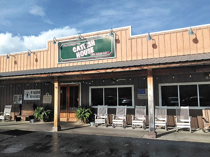 The unassuming wooden exterior of David's Catfish House is like a treasure chest—plain on the outside, filled with golden-fried delights within.