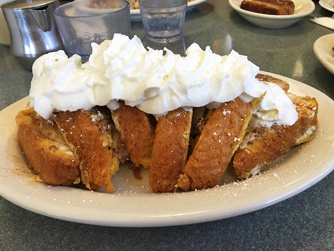 A waffle that understood the fall assignment. That whipped cream swirl isn't just decoration—it's structural engineering at its finest.