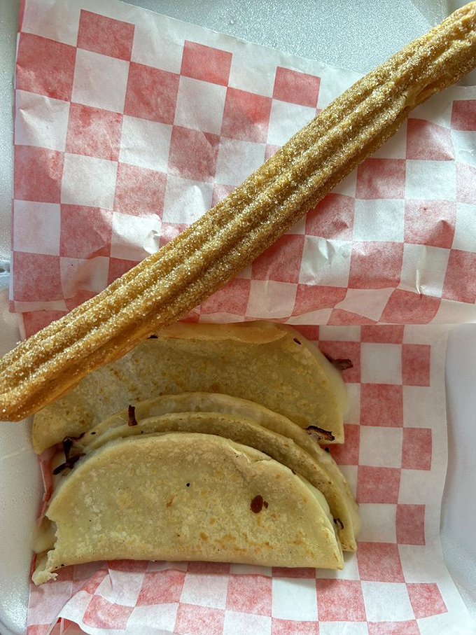 The churro and quesadilla combo—proof that sometimes the best relationships are opposites: one savory, one sweet, both irresistible.
