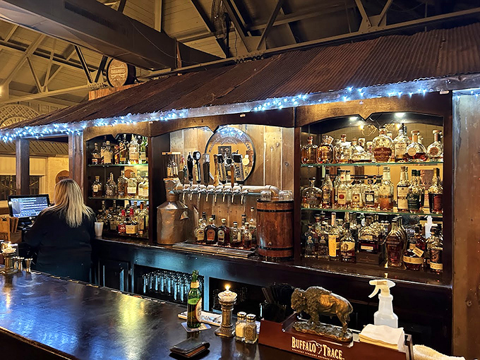 Behind this bar, mixologists craft liberation in liquid form – a delicious irony given the building's history of confinement.
