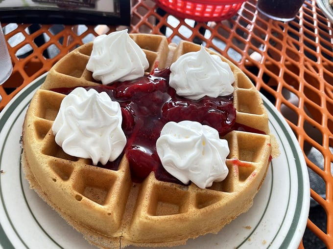 This waffle doesn't need birthday candles to celebrate—the whipped cream dollops and berry compote are throwing their own party.