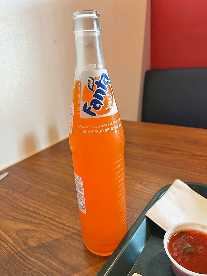 That orange Fanta hits different here—somehow tasting exactly like childhood summers but paired perfectly with adult-level Mexican food.