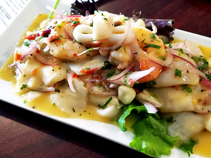 This isn't just ceviche; it's an ocean symphony where seafood, citrus, and herbs perform a three-minute waltz on your taste buds. Refreshingly unpretentious.