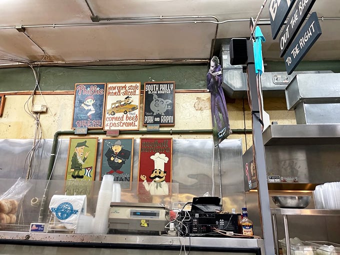 The wall of sandwich possibilities looms above patrons like the Sistine Chapel of deli art. Michelangelo had his ceiling; Stein's has its menu boards.