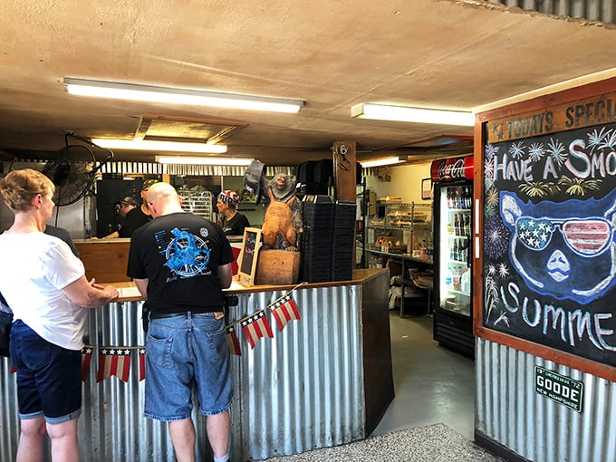 The ordering counter—where hopes rise, decisions are made, and the smoky aroma of what's to come makes even the shortest wait feel worthwhile.