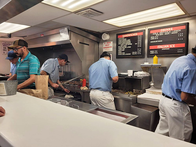 The sandwich artisans of Johnnie's move with the precision of NASA engineers, each motion perfected through thousands of repetitions.