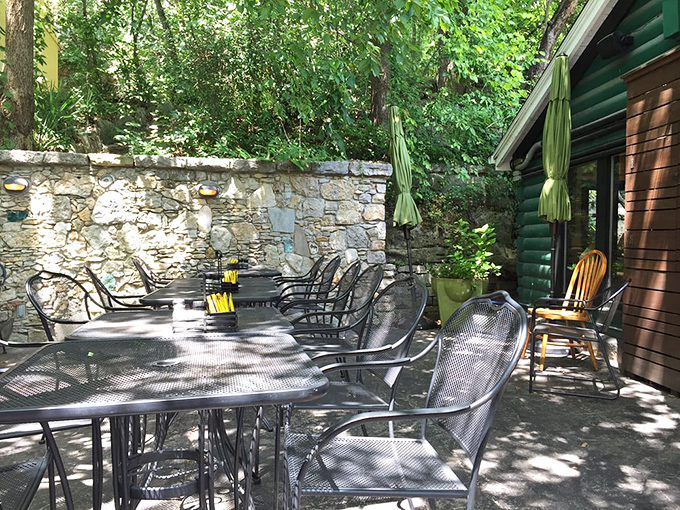 Local Flavor Café's stone-walled patio offers dappled shade and mountain breezes – the perfect setting for a leisurely Ozark afternoon.