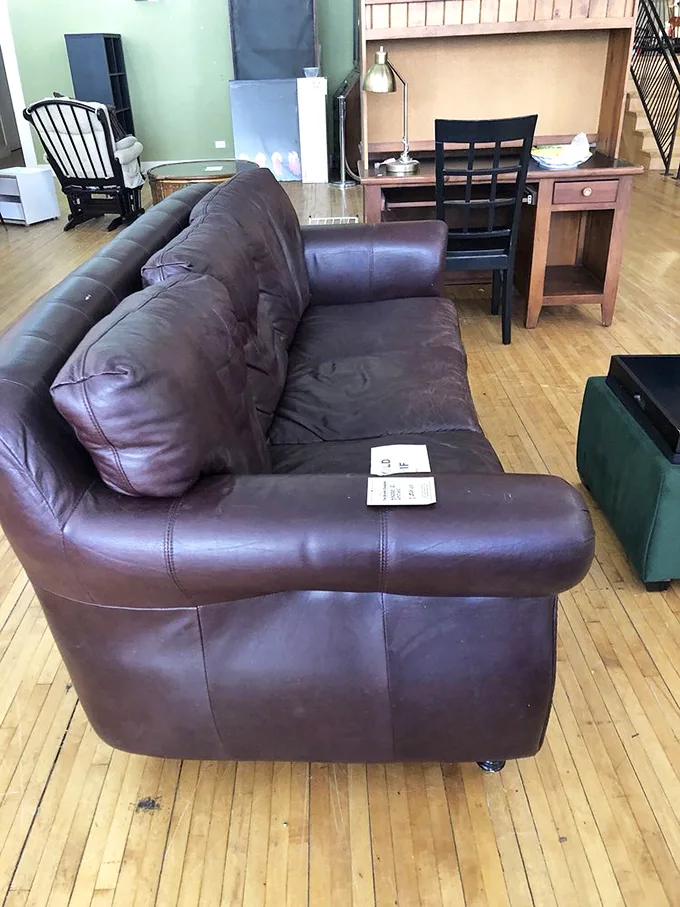 This leather sofa has already broken in the awkward phase for you—like adopting a teenager instead of having a baby.
