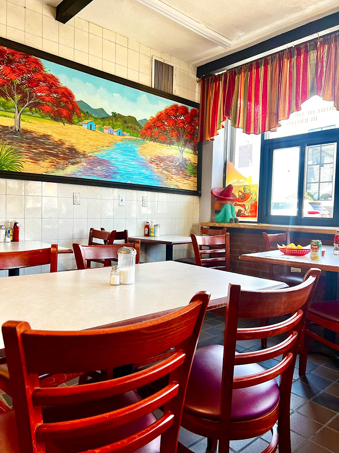 A vibrant mural transports you straight to a Mexican countryside while you demolish your burrito—talk about dinner and a show!