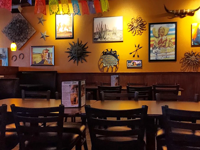 Vibrant wall decorations featuring suns, stars, and vintage posters transport diners to a Mexican cantina without the airfare or passport hassle.