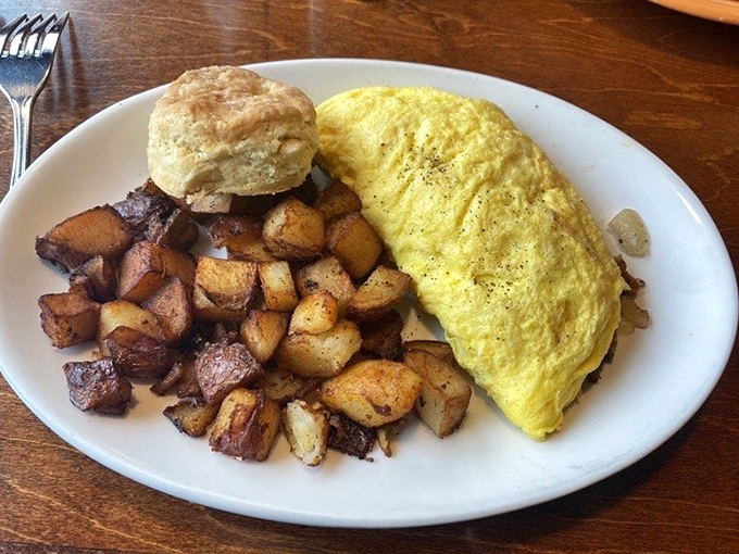The Western omelet – where eggs fulfill their highest purpose alongside potatoes that have achieved crispy-tender perfection.