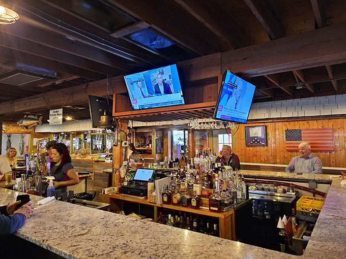 The bar at Dockside isn't just serving drinks—it's serving community, conversation, and the occasional fishing tale that grows with each retelling.