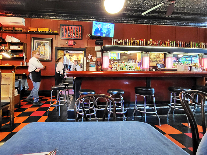 The bar stands ready for service like a faithful old friend. Those stools have supported the weight of countless Pittsburgh stories. 