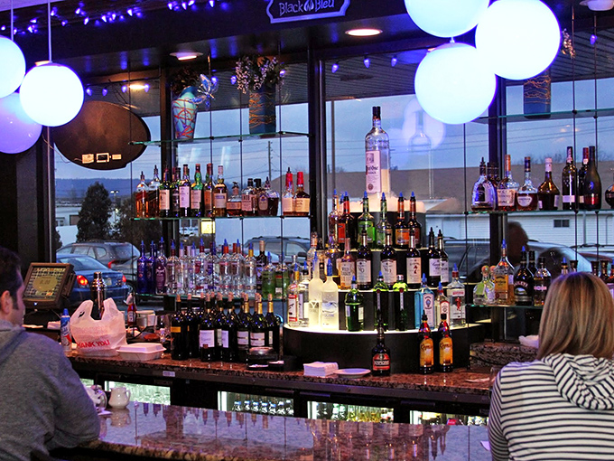 A bar that glows with possibility—each bottle a story waiting to be poured, each glass a memory in the making.