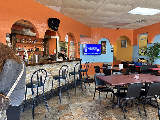 The bar area—where margaritas are born and inhibitions about ordering "just one more taco" go to die.
