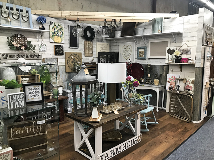 The farmhouse aesthetic booth looks like Joanna Gaines had a yard sale, and I mean that as the highest compliment possible.