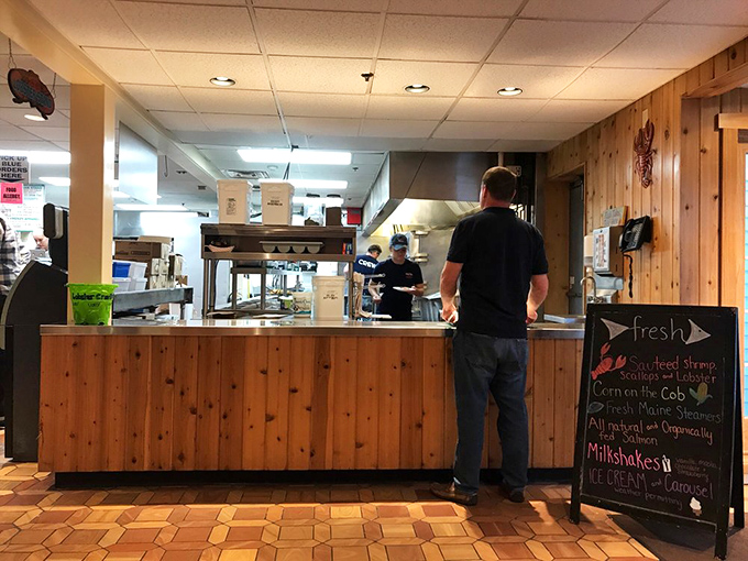 Where the magic happens—the counter service area lined with knotty pine paneling. Simple, efficient, and utterly Connecticut in the best possible way.