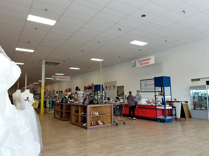 The nerve center of operations where helpful staff orchestrate the thrifting symphony—customer service with a side of shoe displays.